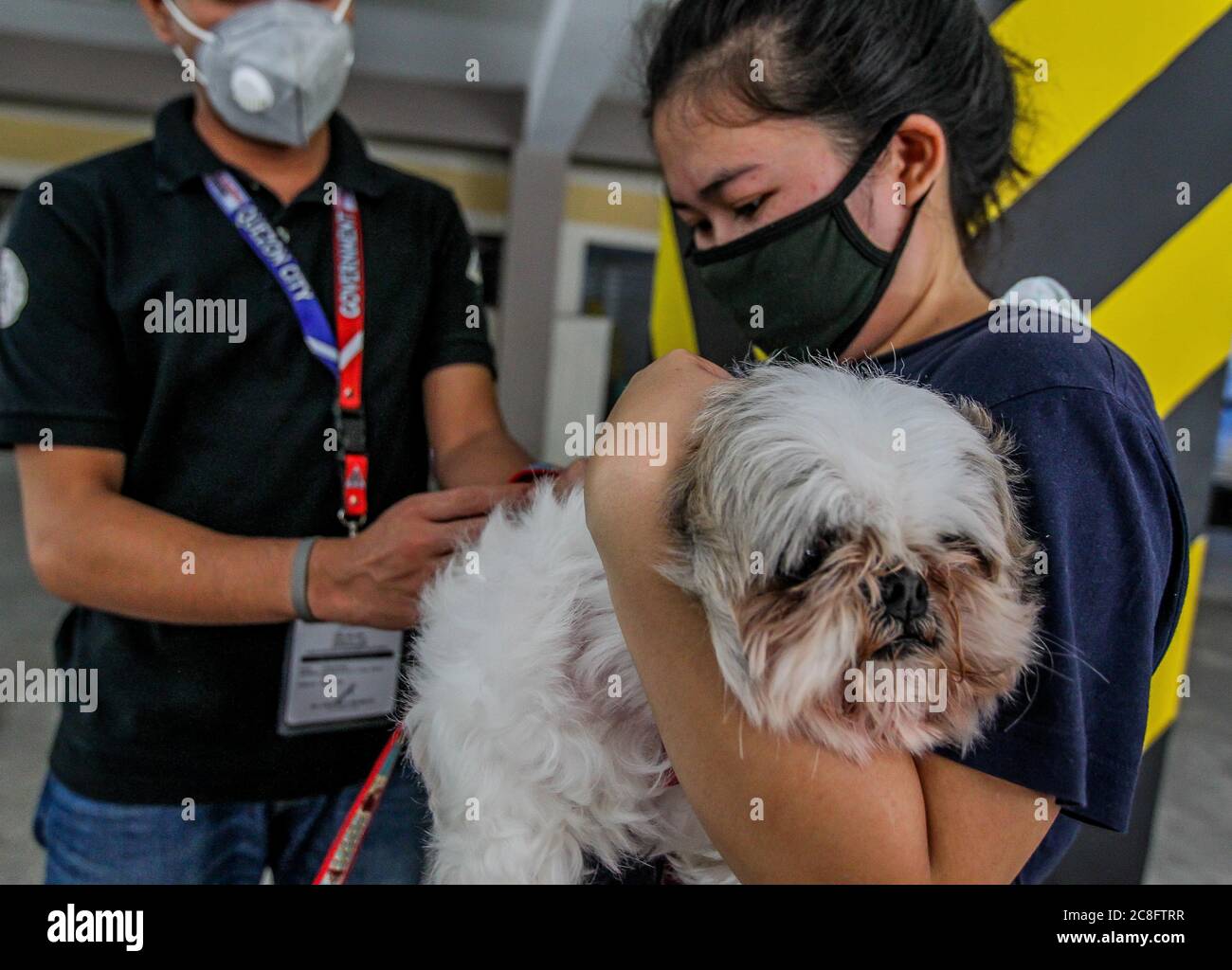 Manila, Philippines. 24th July, 2020. A pet dog is given a free anti ...