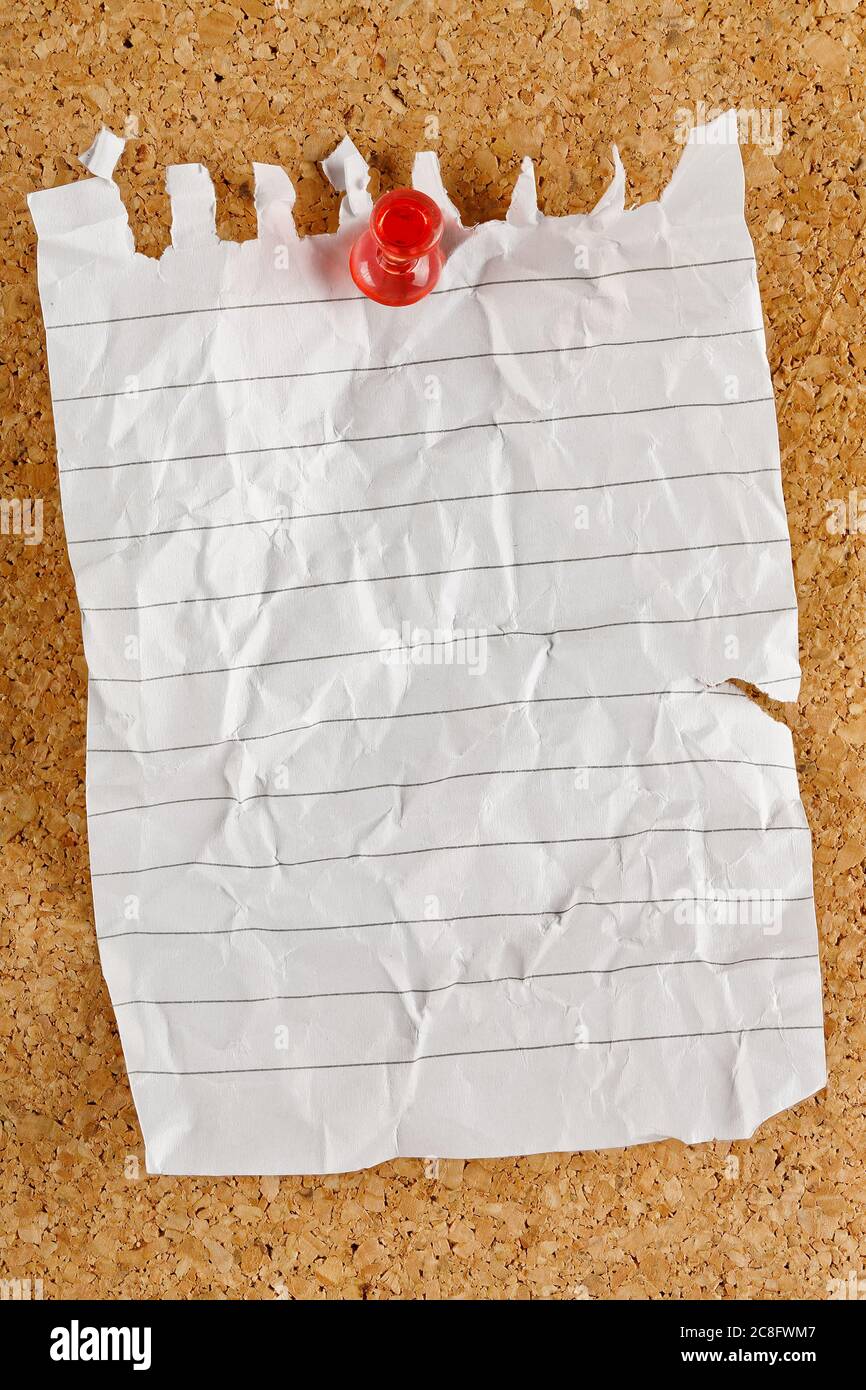 macro of crumpled note on notice board Stock Photo - Alamy