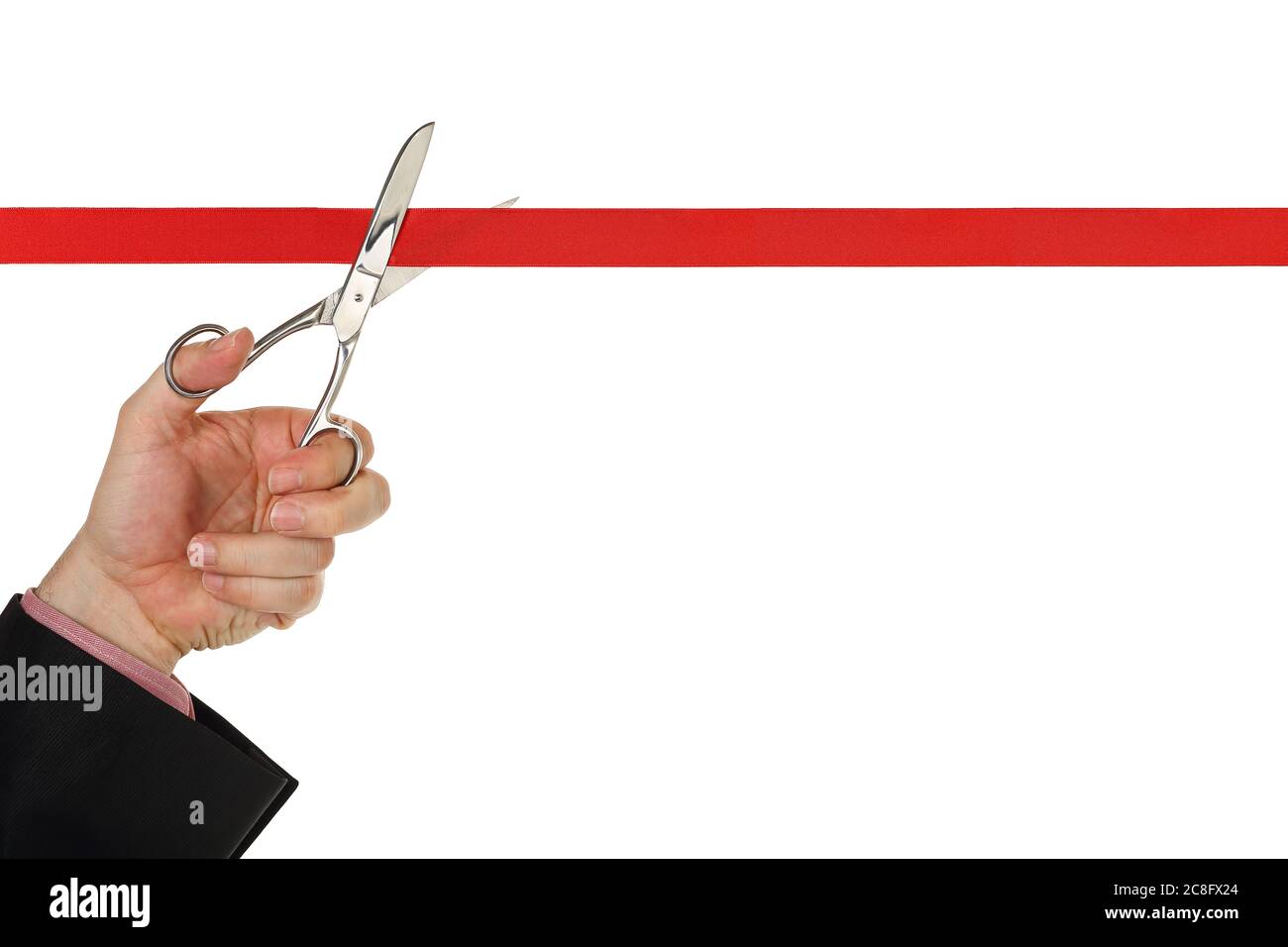 hand with scissors cutting a red ribbon isolated on white Stock Photo ...