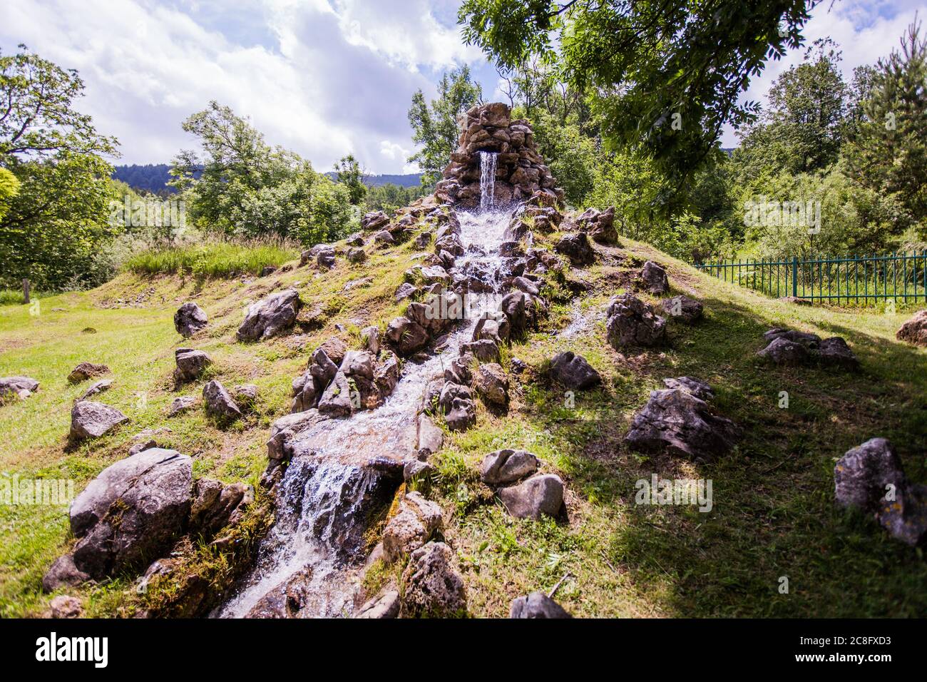 Small waterfall rocks cascade, fresh running water, summer daylight ...