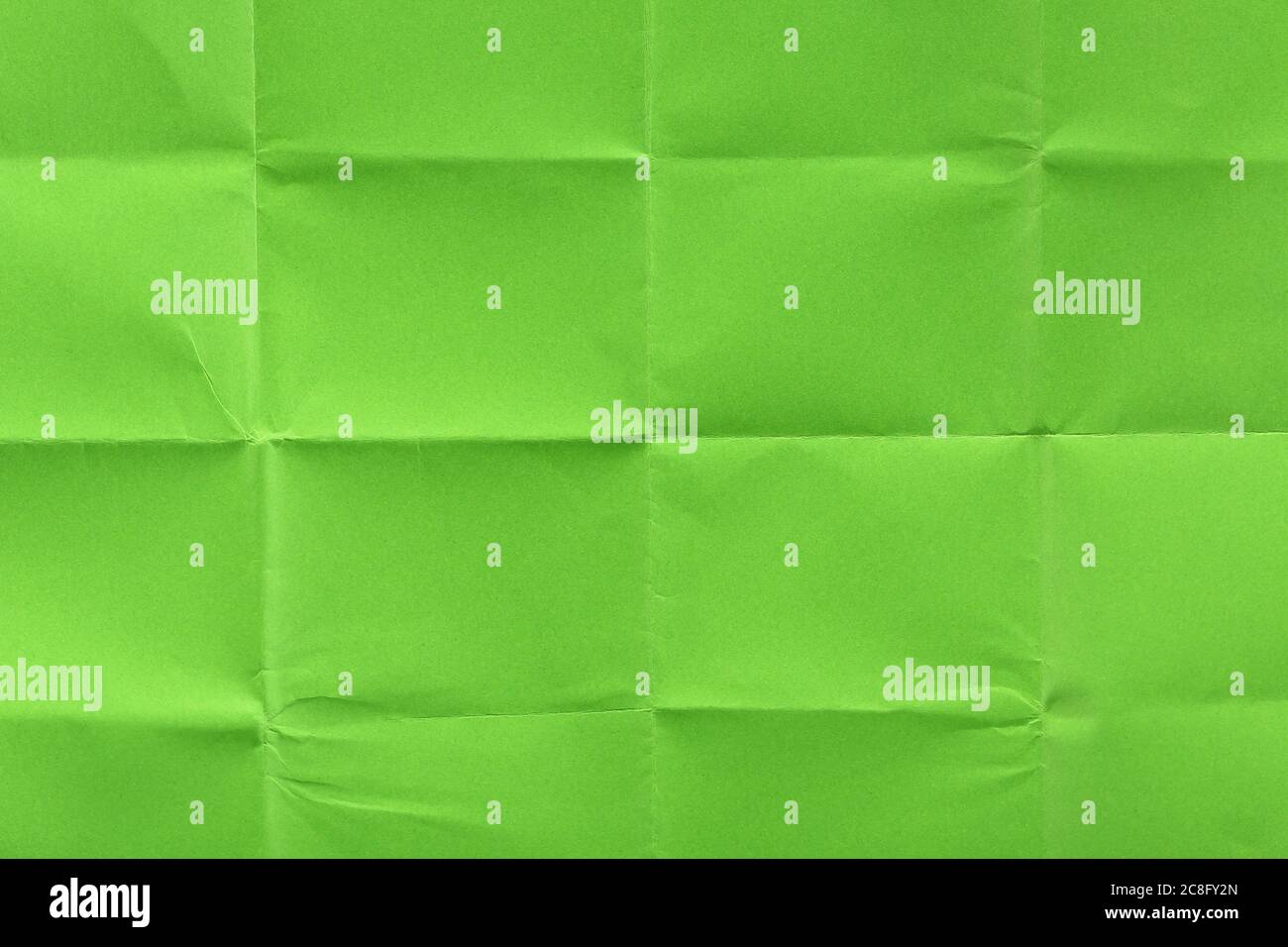 folded green paper for background use Stock Photo - Alamy