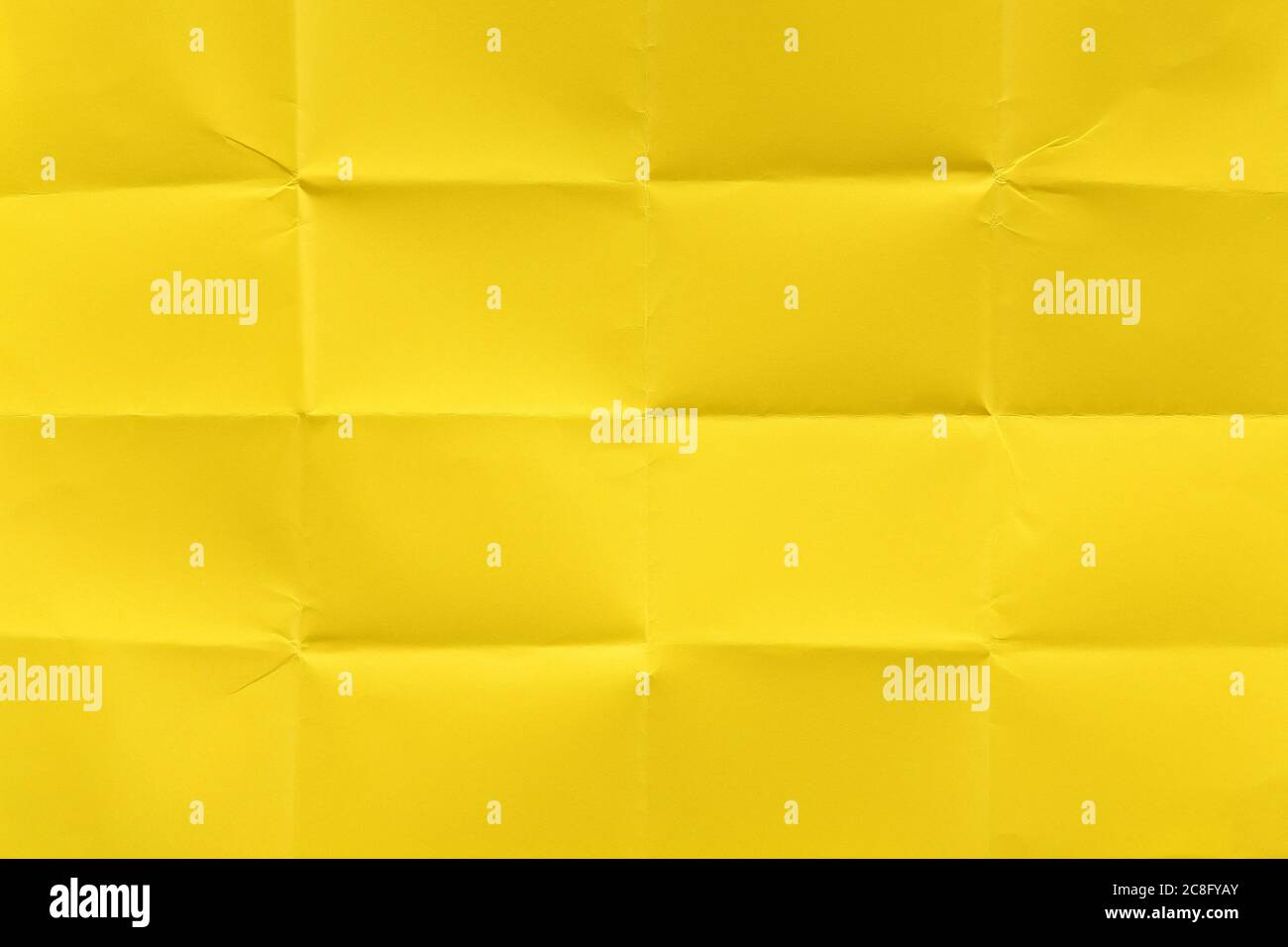 closeup of folded yellow paper for backgrounds Stock Photo - Alamy