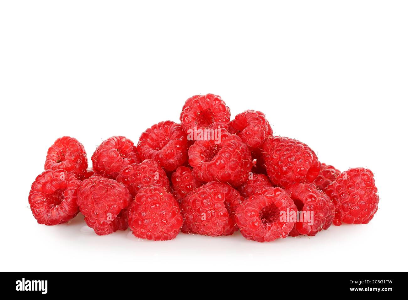 pile of ripe raspberries isolated on white background Stock Photo - Alamy