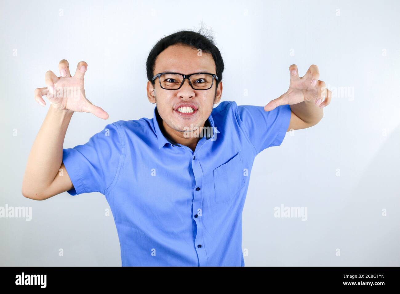 Angry guy yelling finger pointing hi-res stock photography and images ...