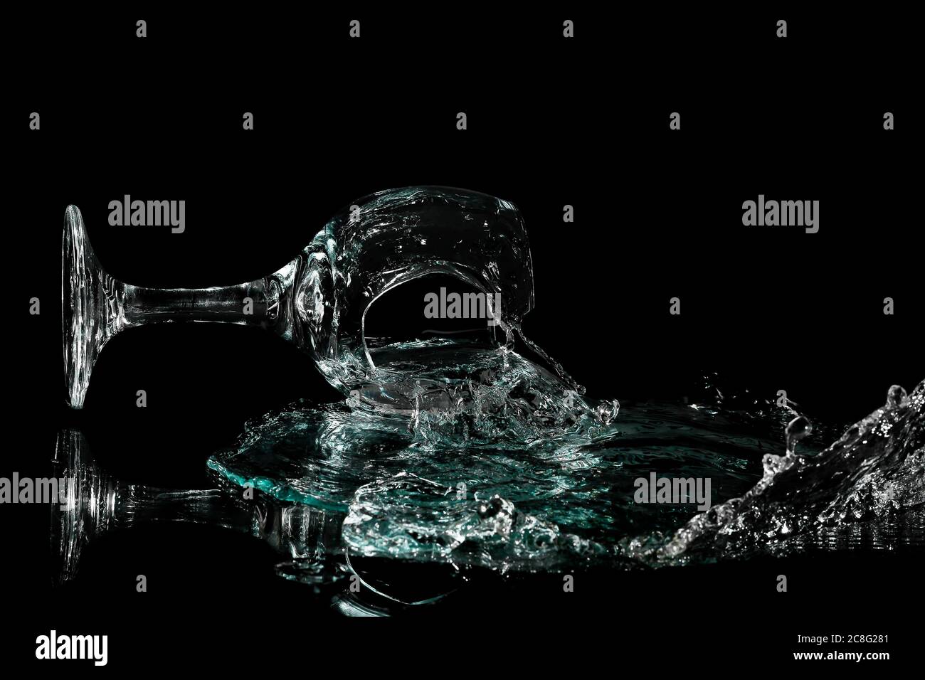 glass of water while breaking to pieces Stock Photo - Alamy