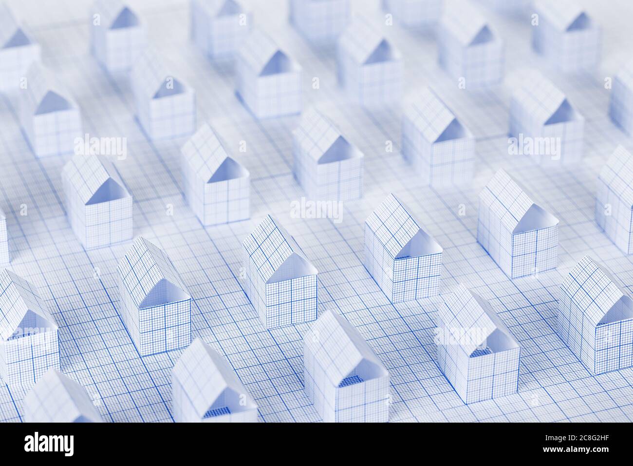 miniature paper houses made with millimeter paper Stock Photo - Alamy