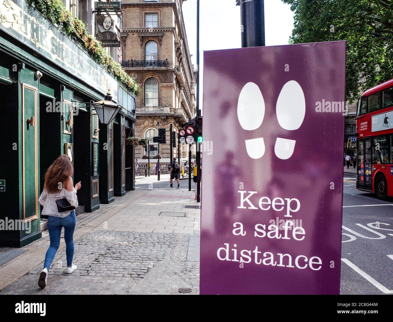 'Keep a Safe Distance' Covid 19 sign on street near Victoria Station in ...