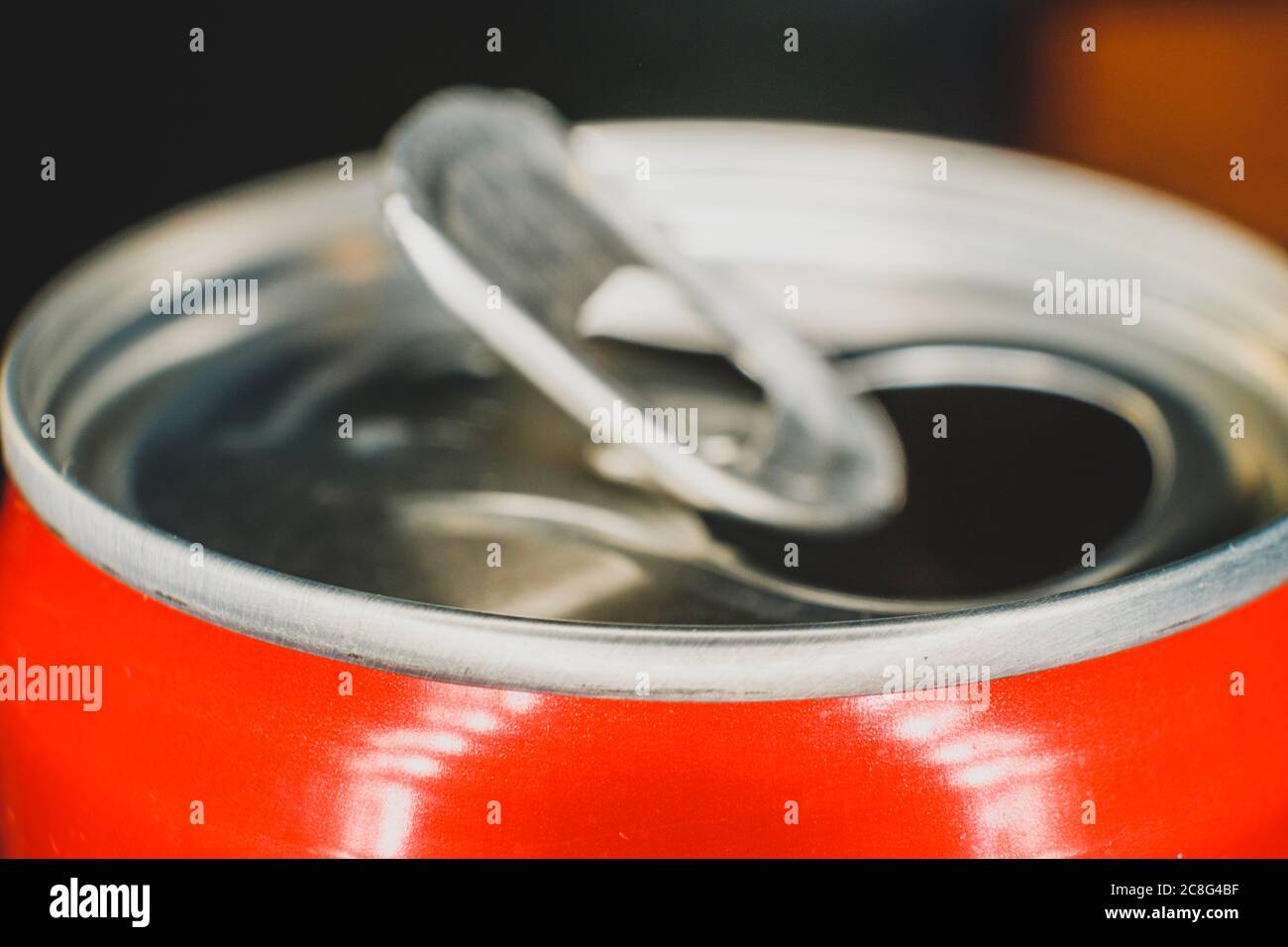 Side view of Open Soda Can Pull Tab. An open can of carbonated beverage ...