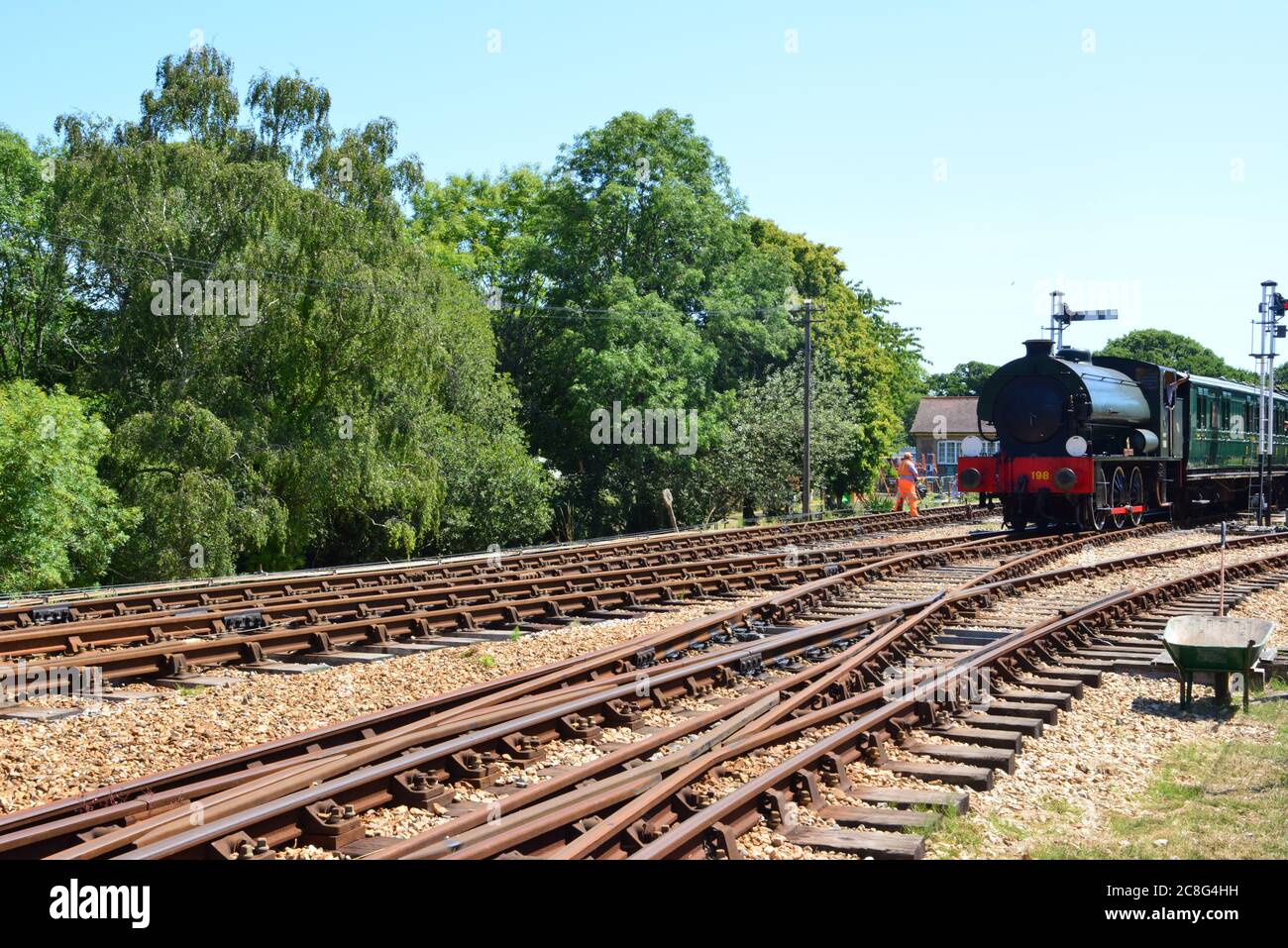 A Hunslet Austerity locomotive pulling a passenger train out of Haven ...