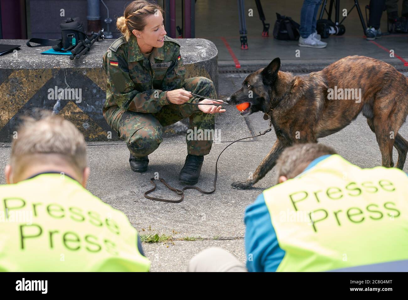 Ulmen, Germany. 24th July, 2020. Dog handler Sina Knisel rewards at the ...