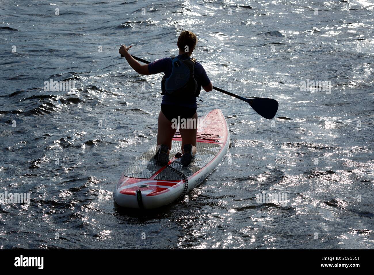 Senior paddle boarding hi-res stock photography and images - Alamy