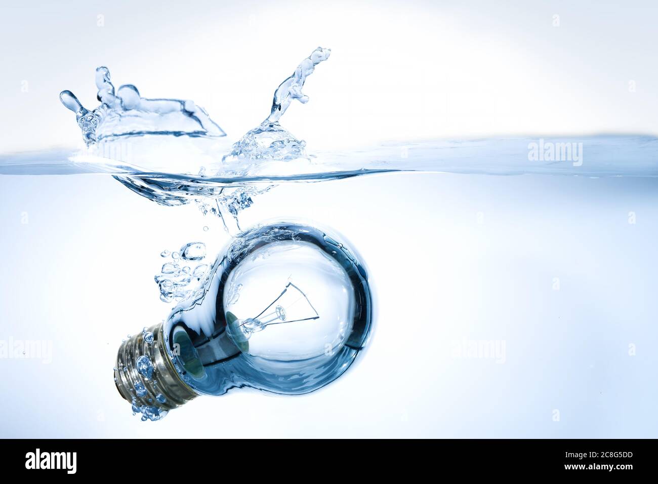 lightbulb falling into water Stock Photo - Alamy