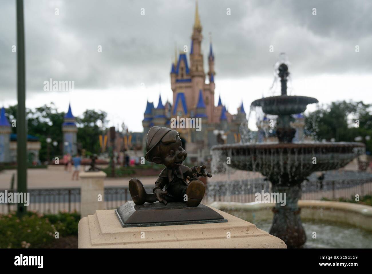 July 23, 2020, Orlando, FLA, USA: A statue of Pinocchio with Cinderella ...