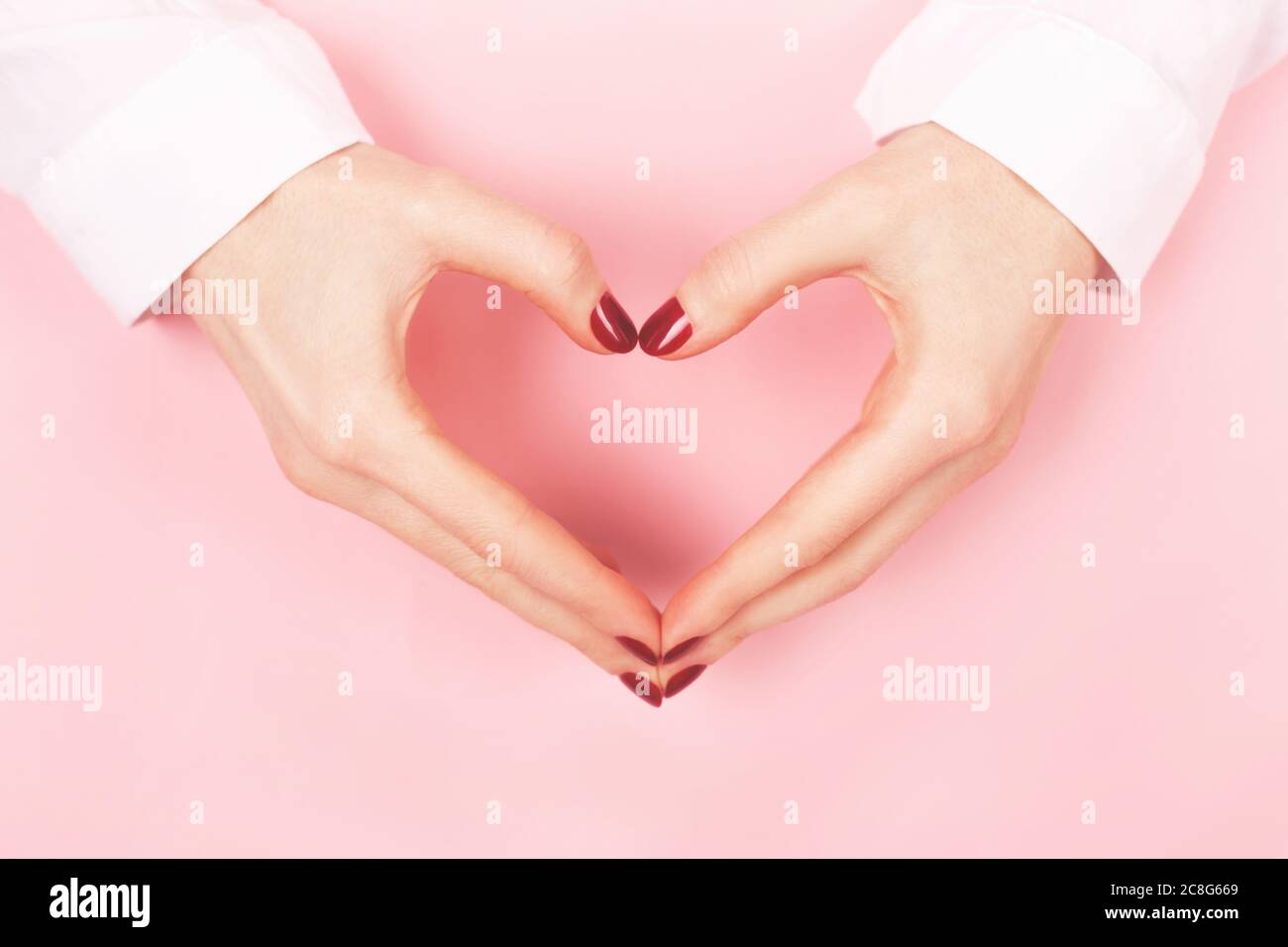 Two hands form heart shape hi-res stock photography and images - Alamy