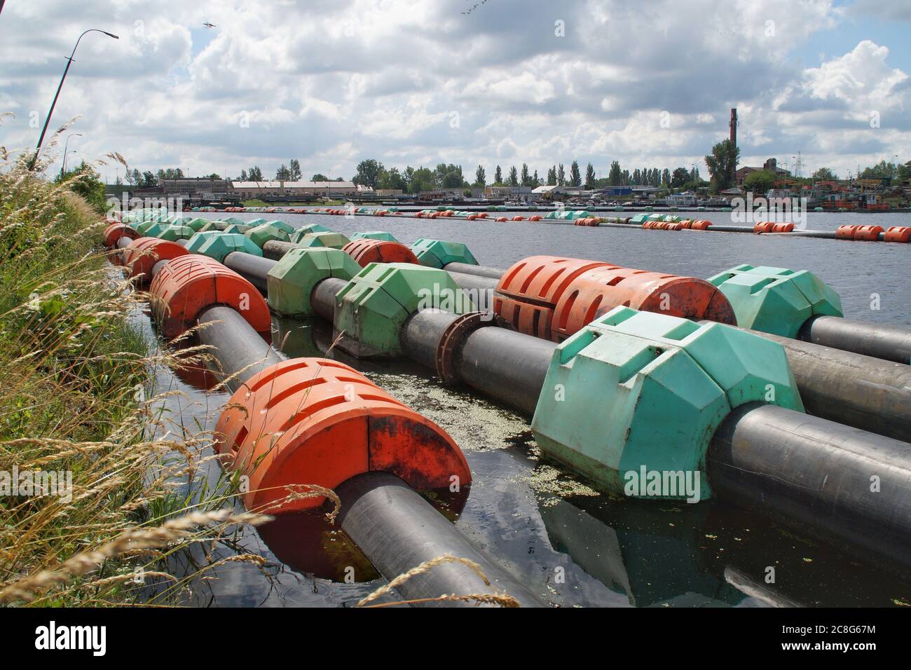 Elements of a floating pipeline on the water Stock Photo - Alamy