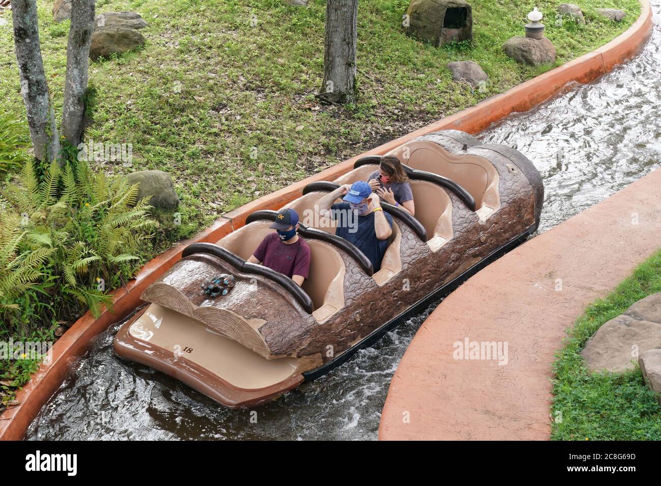 Orlando, FLA, USA. 23rd July, 2020. People ride the attraction Splash ...
