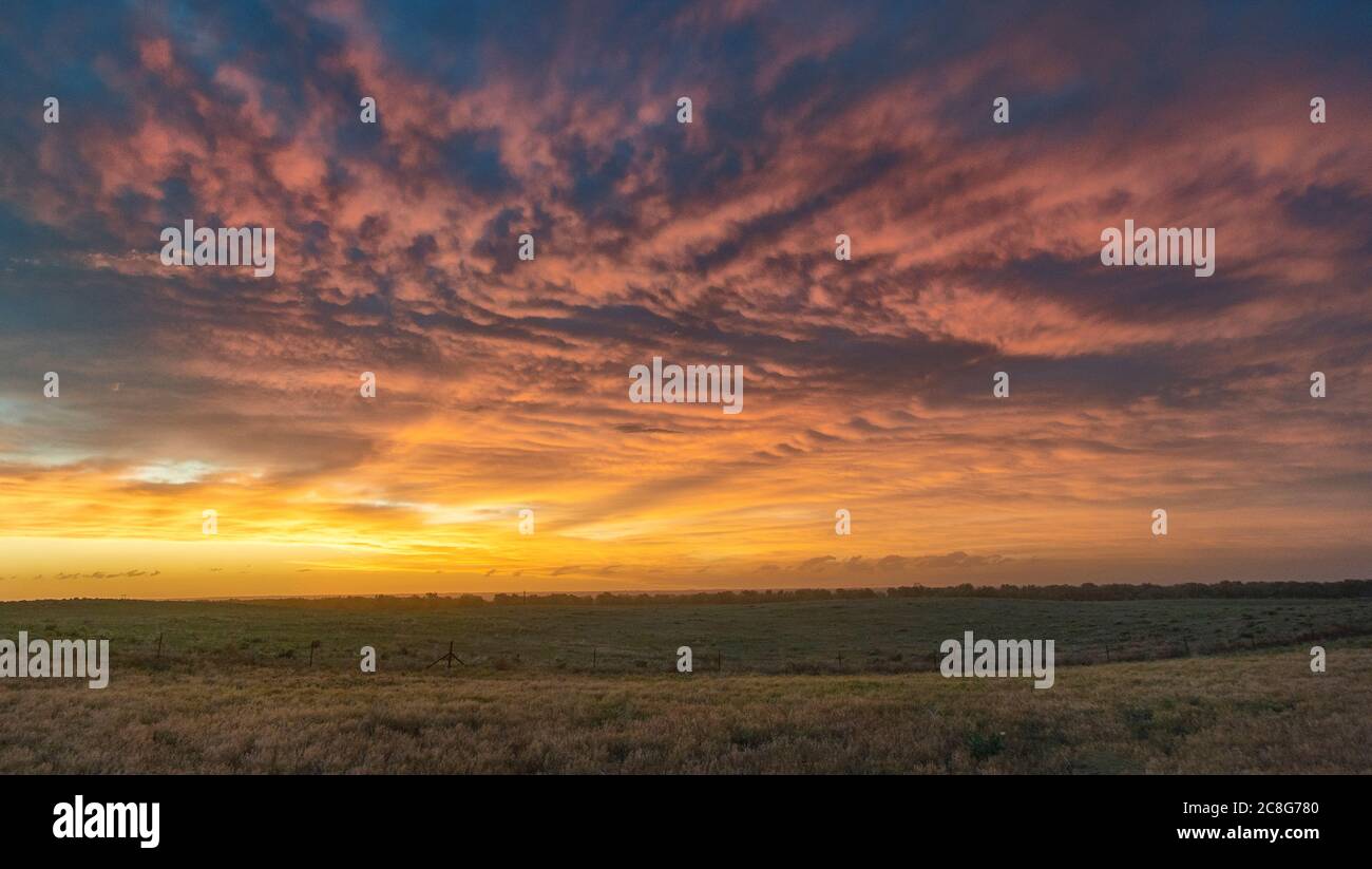 Gravity wave clouds in the sky at sunset Stock Photo - Alamy