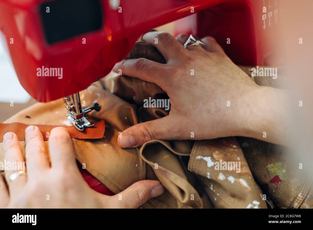 Male artisan using sewing hi-res stock photography and images - Alamy