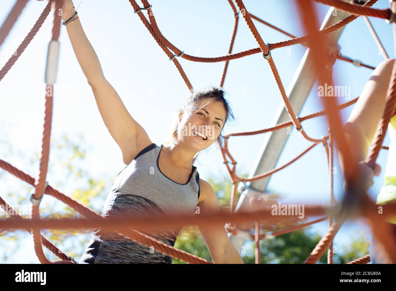 Woman climbing down rope hi-res stock photography and images - Alamy