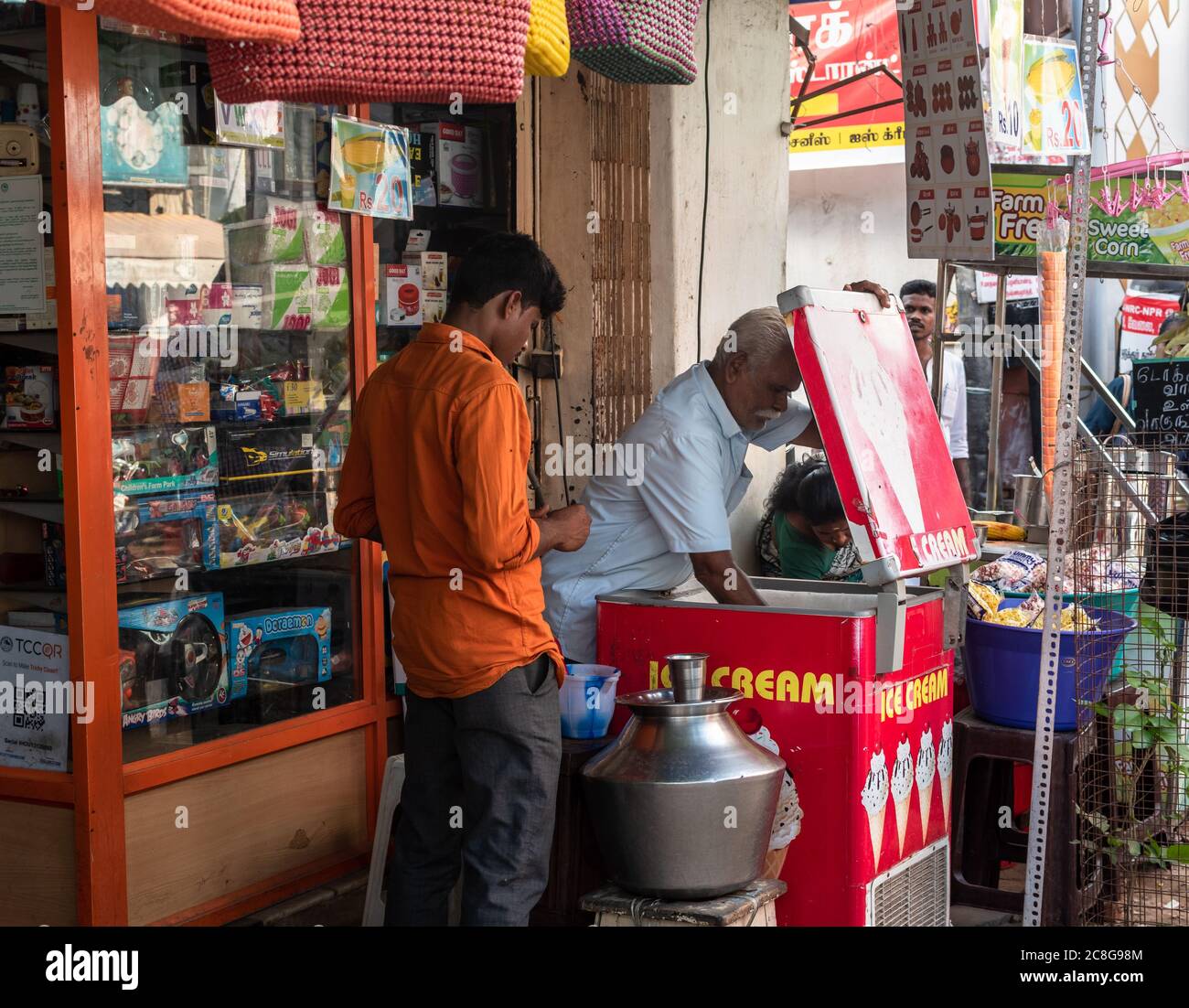Indian man selling ice cream hi-res stock photography and images - Alamy