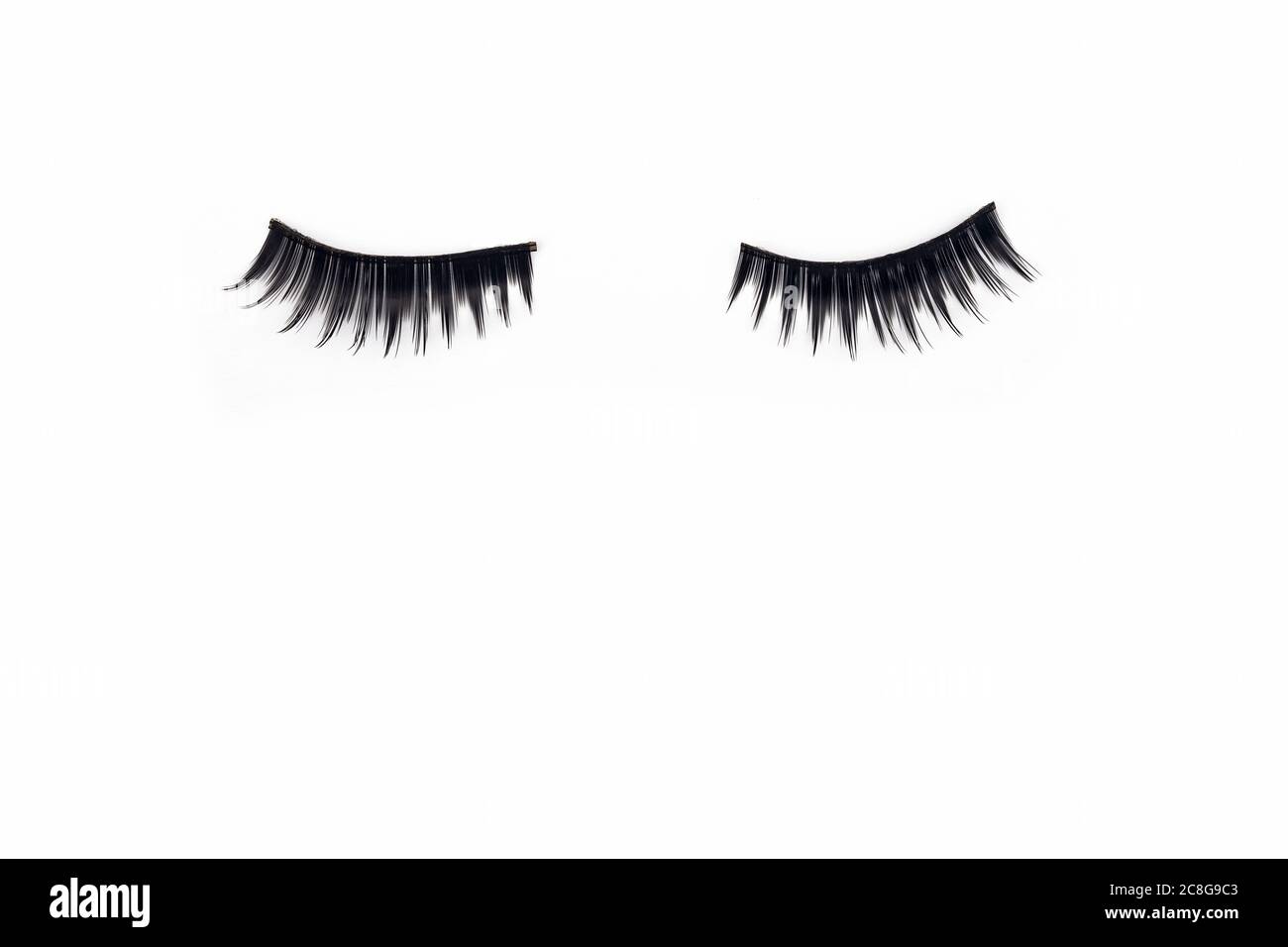 Two Eyelashes extensions on white background Stock Photo - Alamy