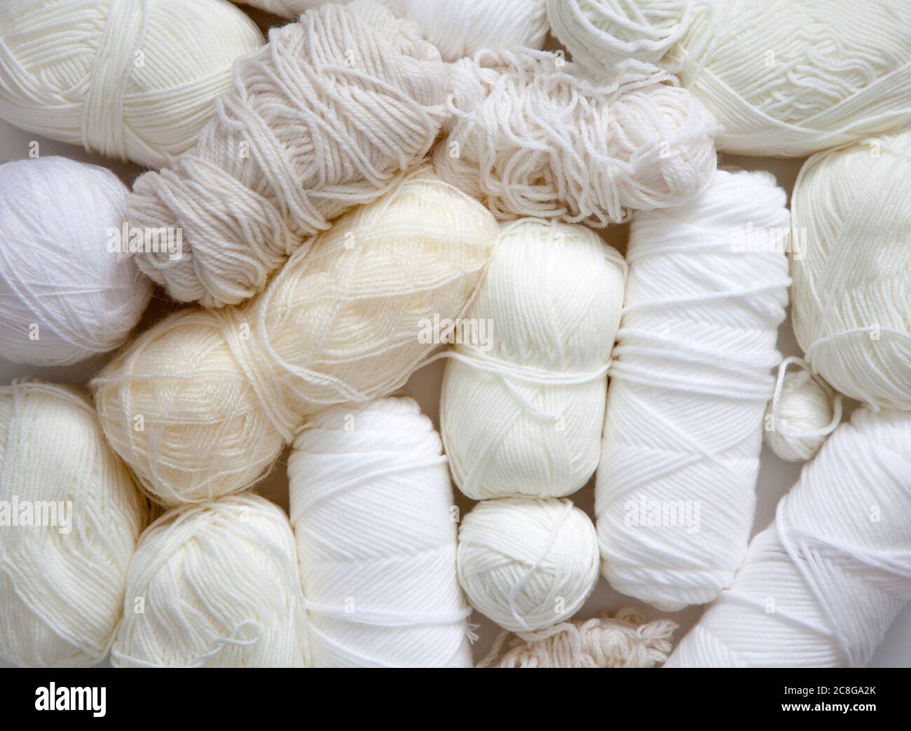 White, light, neutral yarn for knitting. Top view Stock Photo - Alamy
