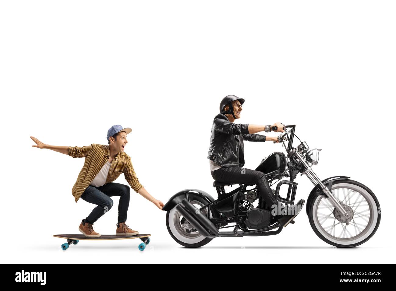 Full length profile shot of an elderly biker riding a chopper and ...