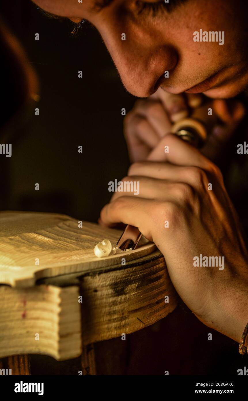 Female violin maker hi-res stock photography and images - Alamy