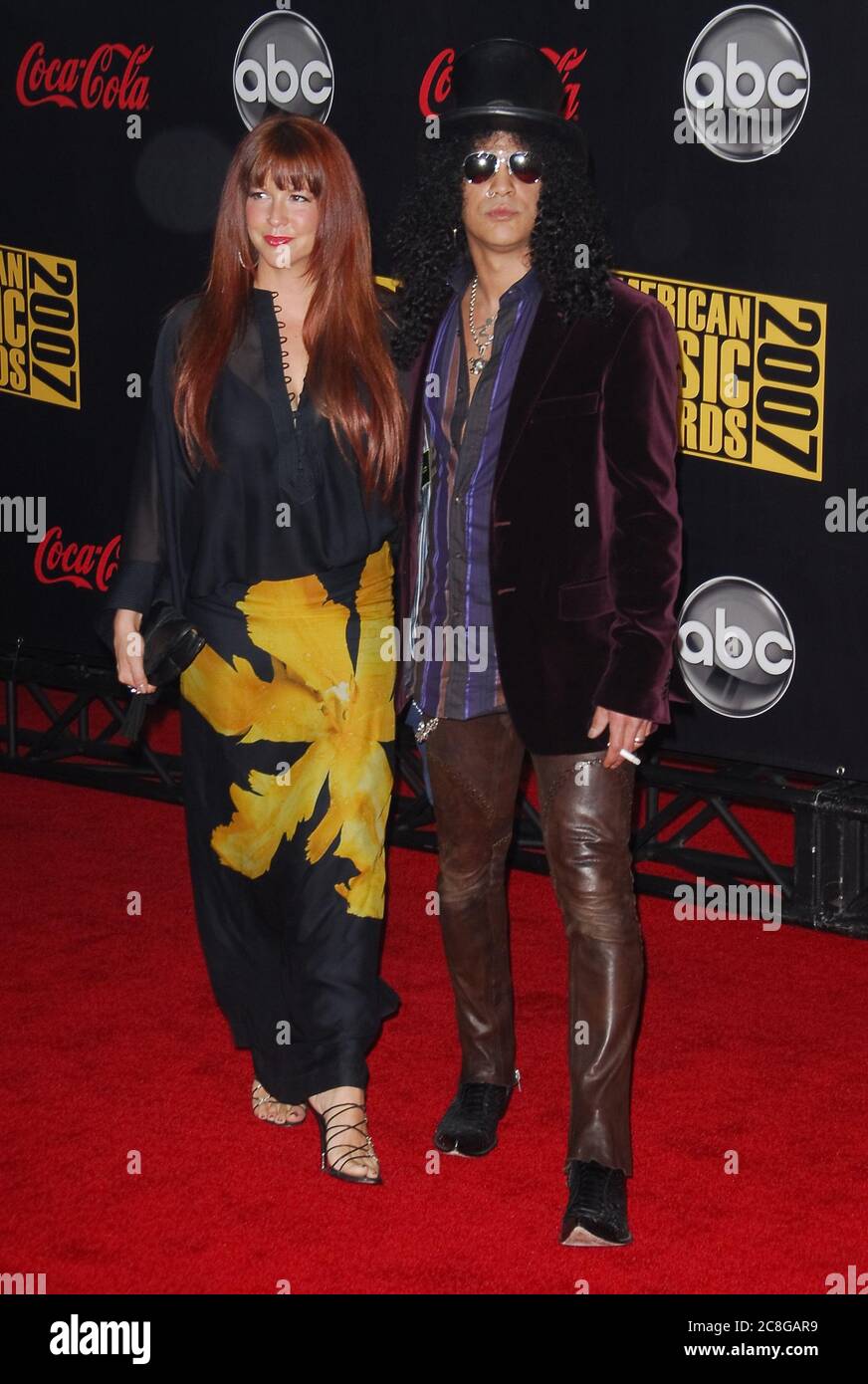 SLash (R) and Perla Ferrar at the 2007 American Music Awards held at ...