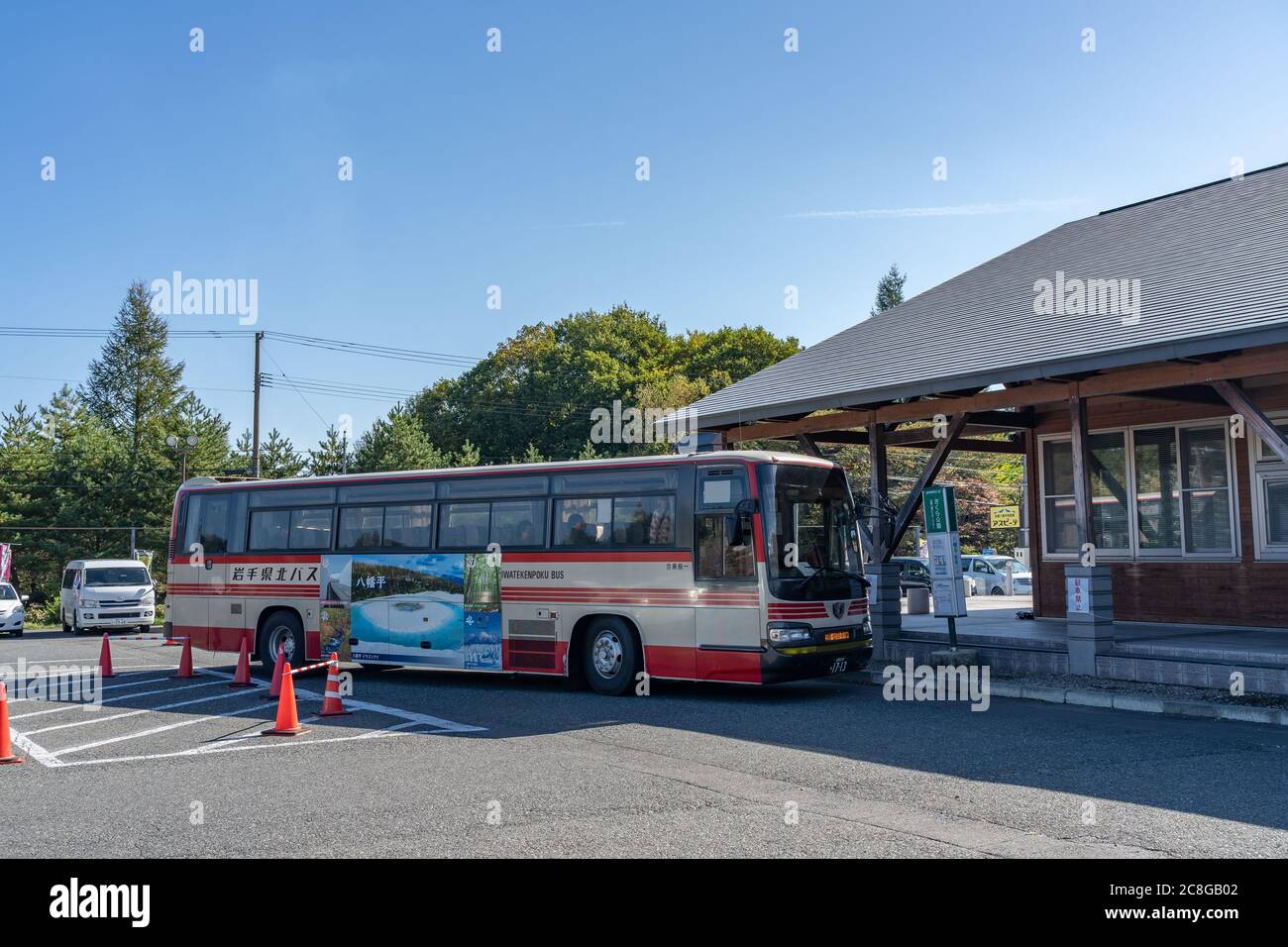 Local bus stops at Matsuo-Hachimantai Visitor Center Stock Photo - Alamy