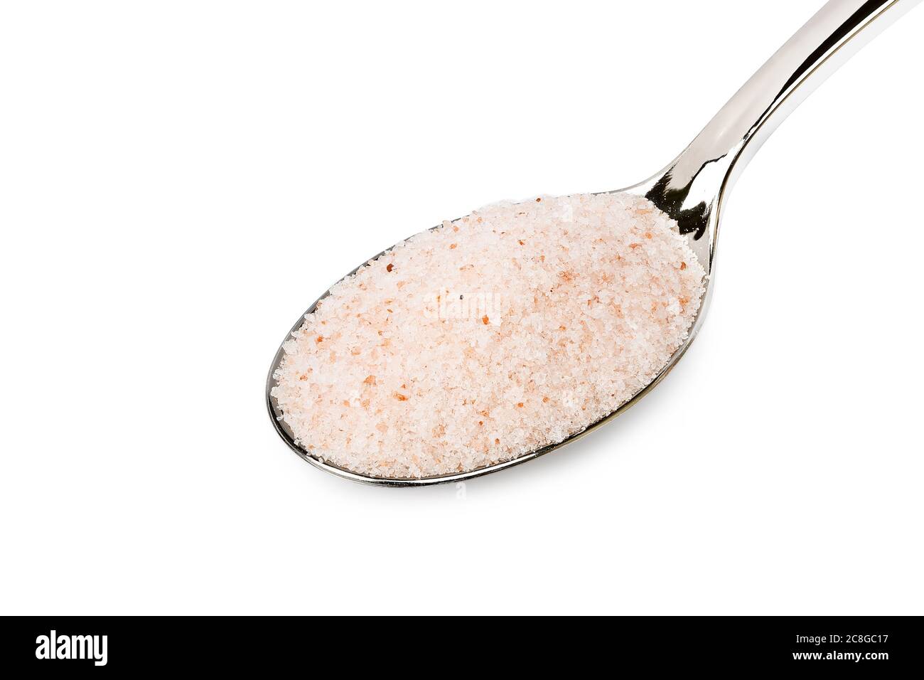 himalayan salt on spoon isolated on white Stock Photo - Alamy