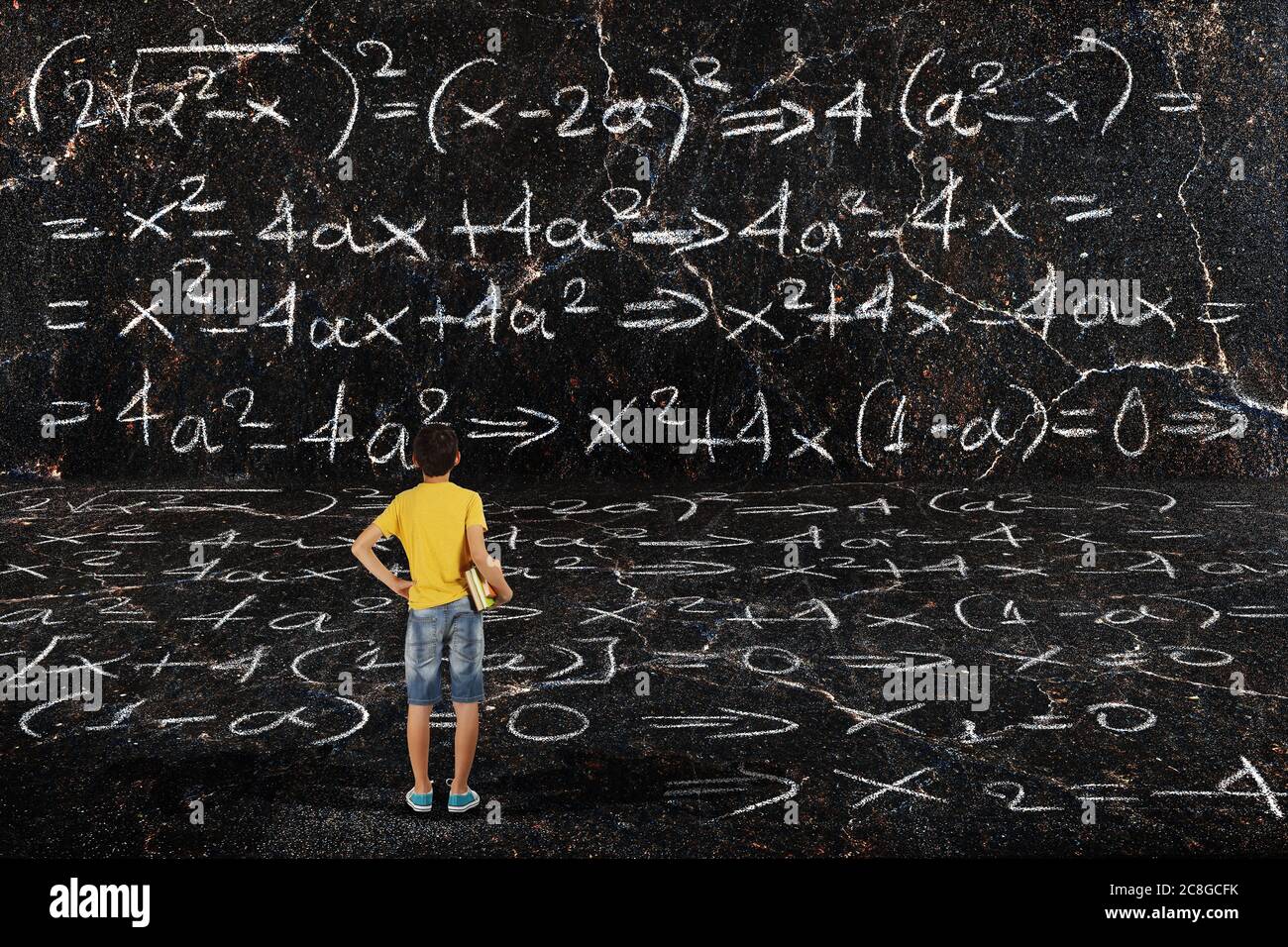 student with books in a huge classroom with equations everywhere ...