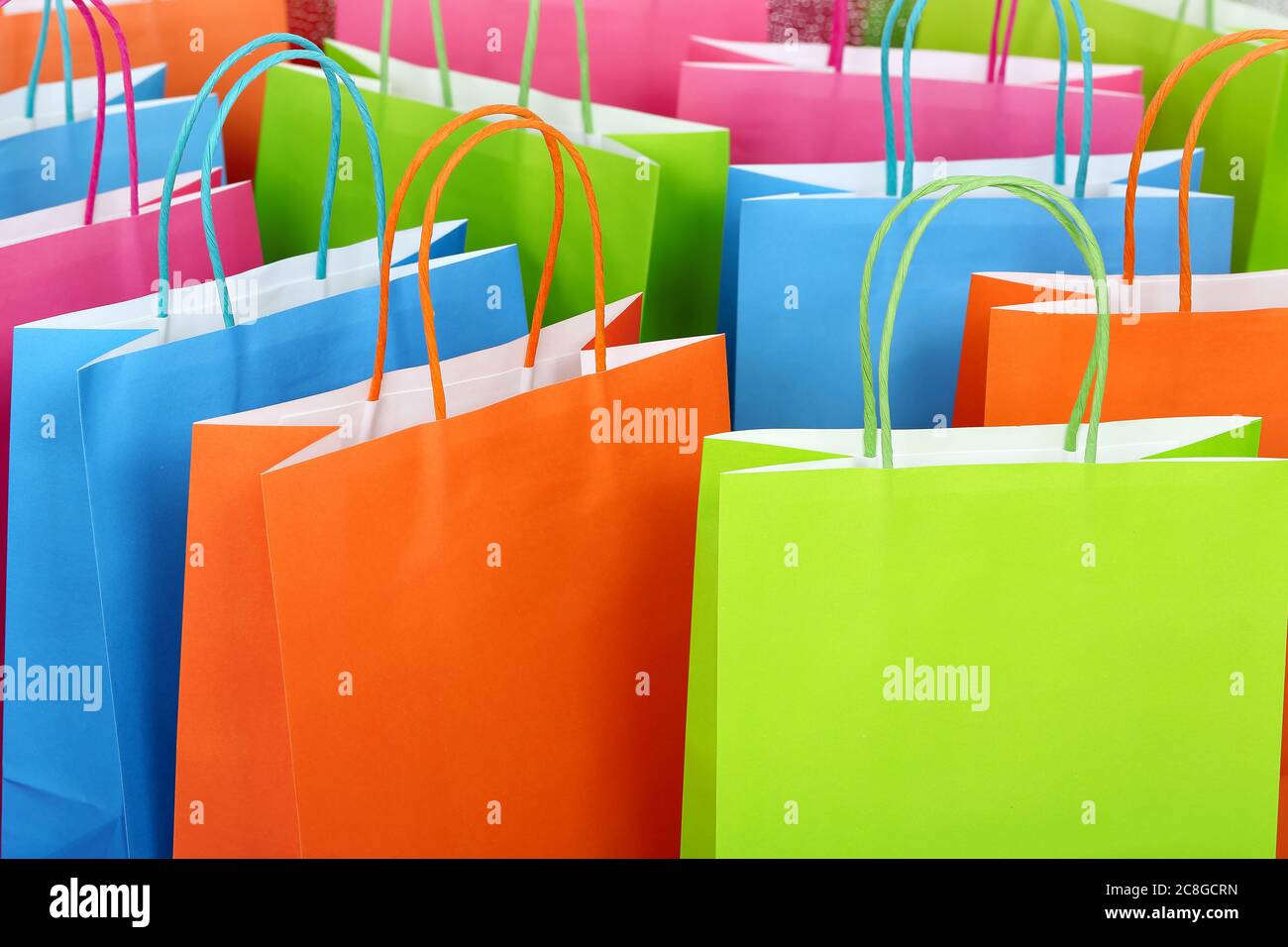 Orange green and blue paper bags hi-res stock photography and images ...