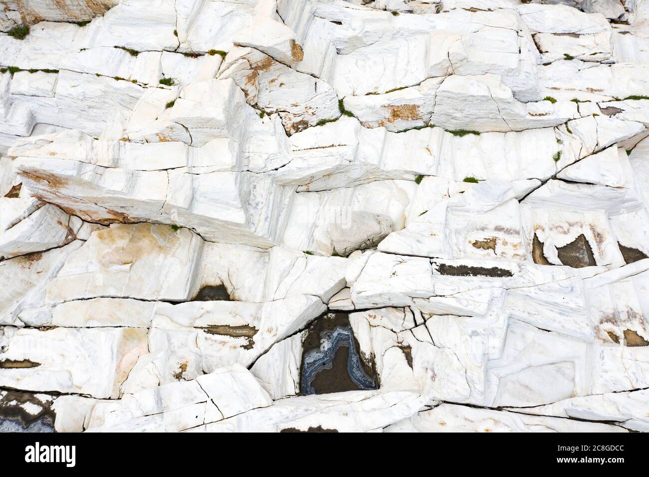 Aerial view of blocks of marble in the sea on Aliki, Thassos island ...