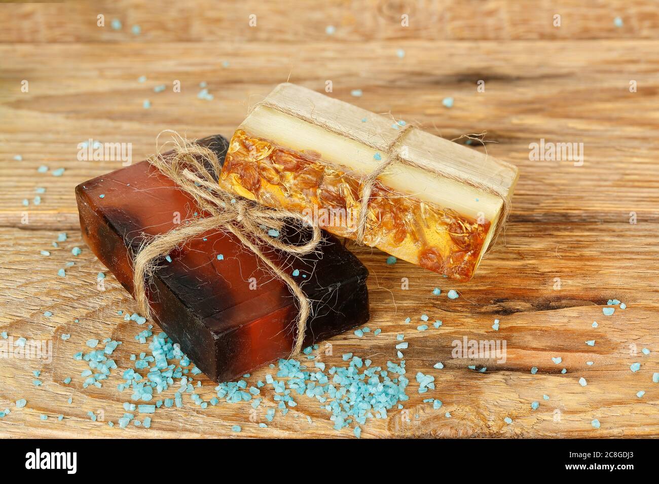 aromatic soap with spa salt on wooden surface Stock Photo - Alamy