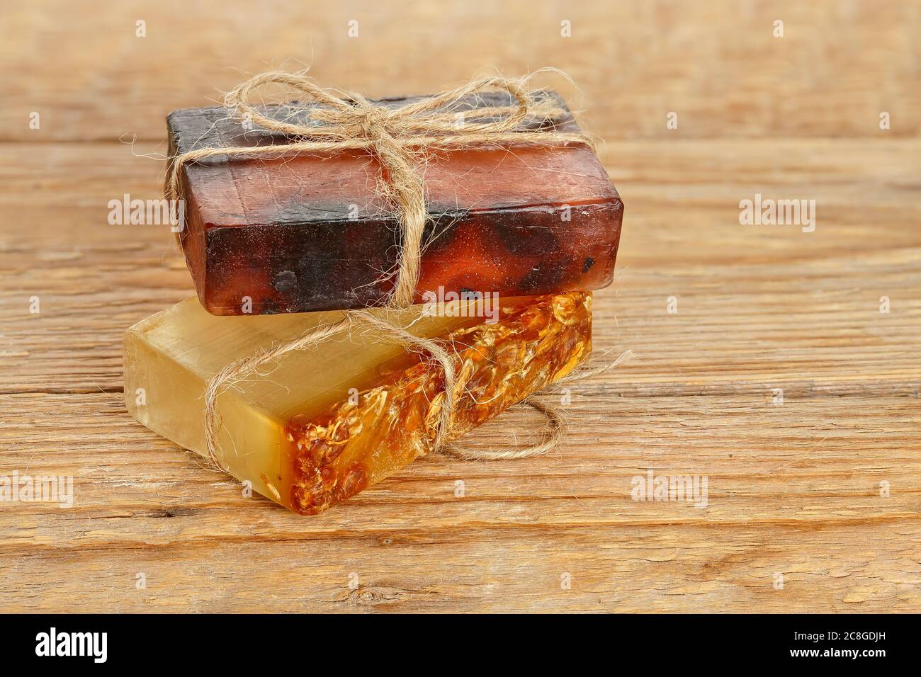 bars of aromatic soap on wooden surface Stock Photo - Alamy