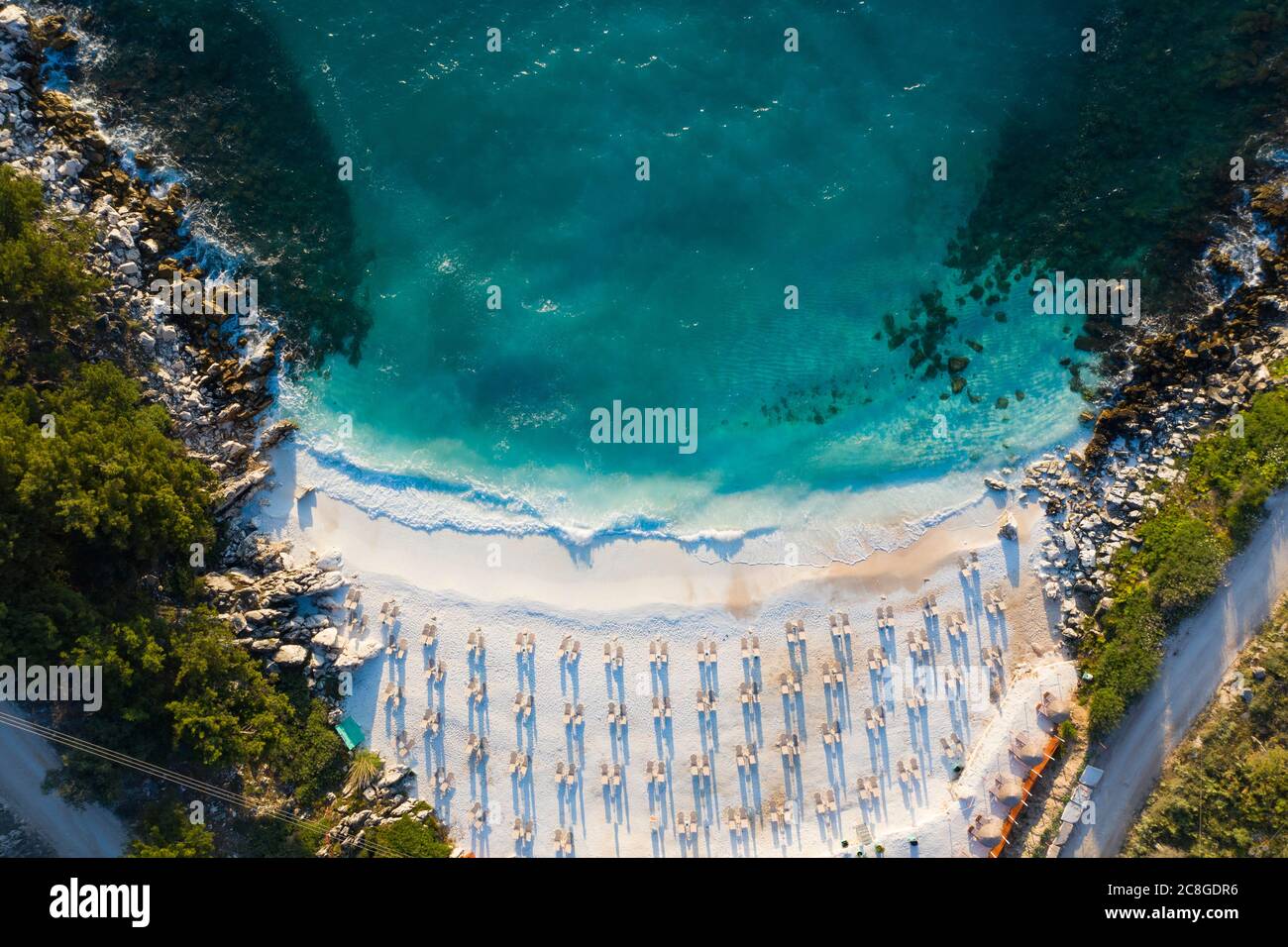 Aerial view of Marble beach. The most beautiful white beach in Greece ...