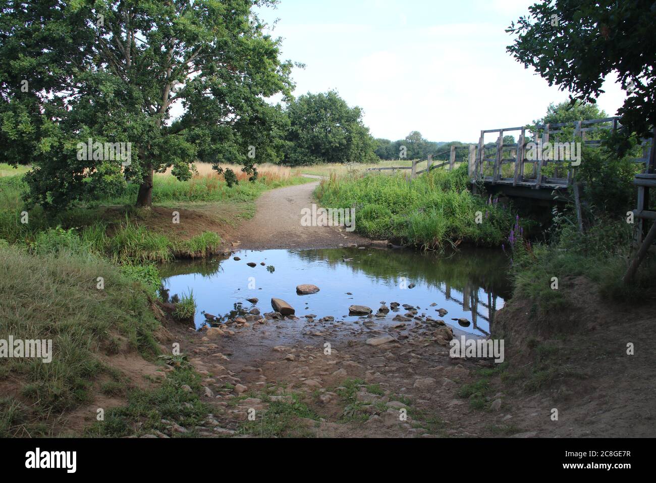 ford and bridge over a small stream Stock Photo - Alamy
