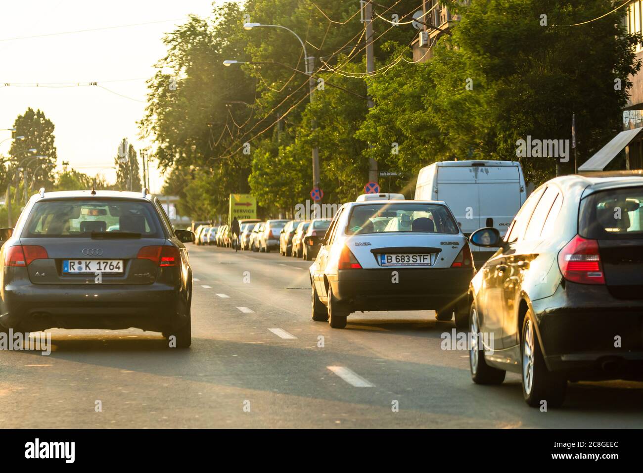 Car traffic at rush hour in downtown area. Traffic jam, cars on the ...