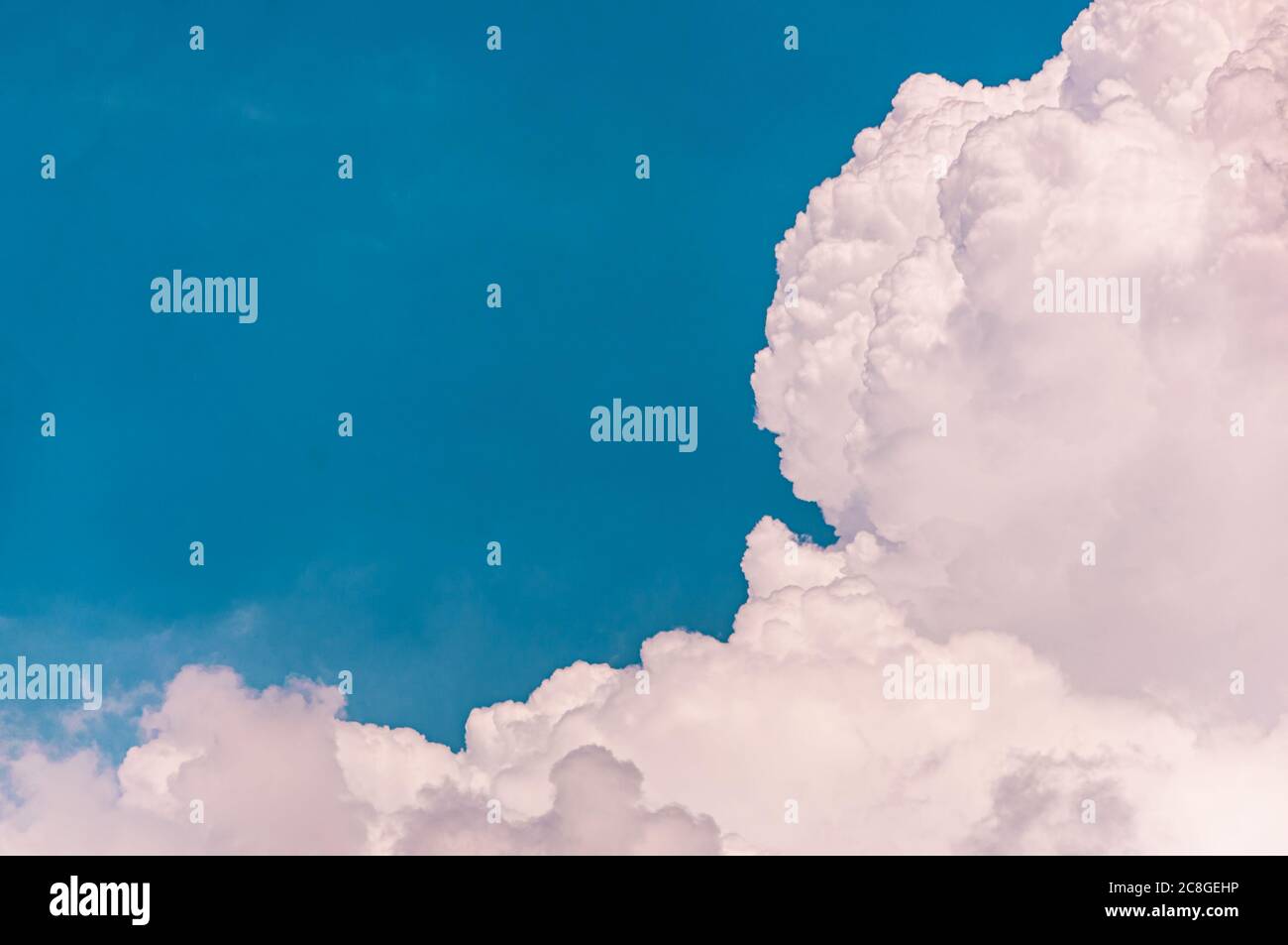 Massive rain clouds, Cumulonimbus fluffy cloud forming in the blue sky ...
