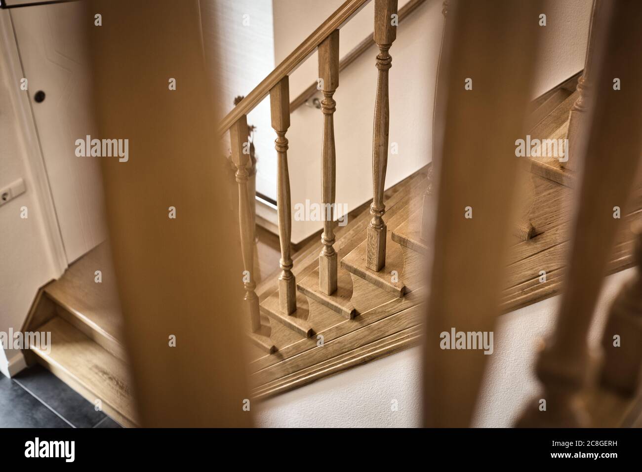Wooden Railing of an luxury antique staircase, woodwork elements macro ...