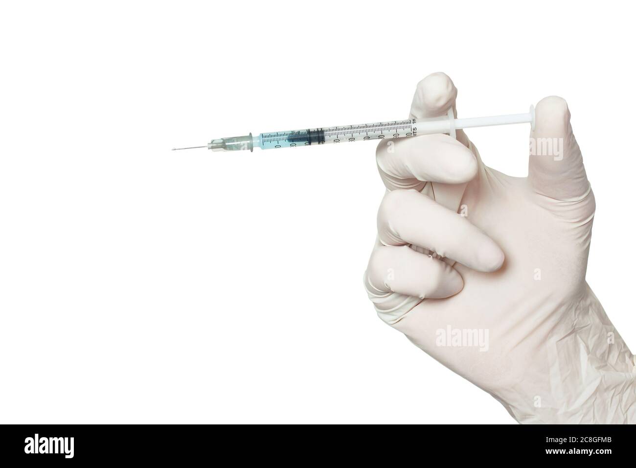 Syringe in a hand of the doctor or nurse. Hands in medical gloves ...