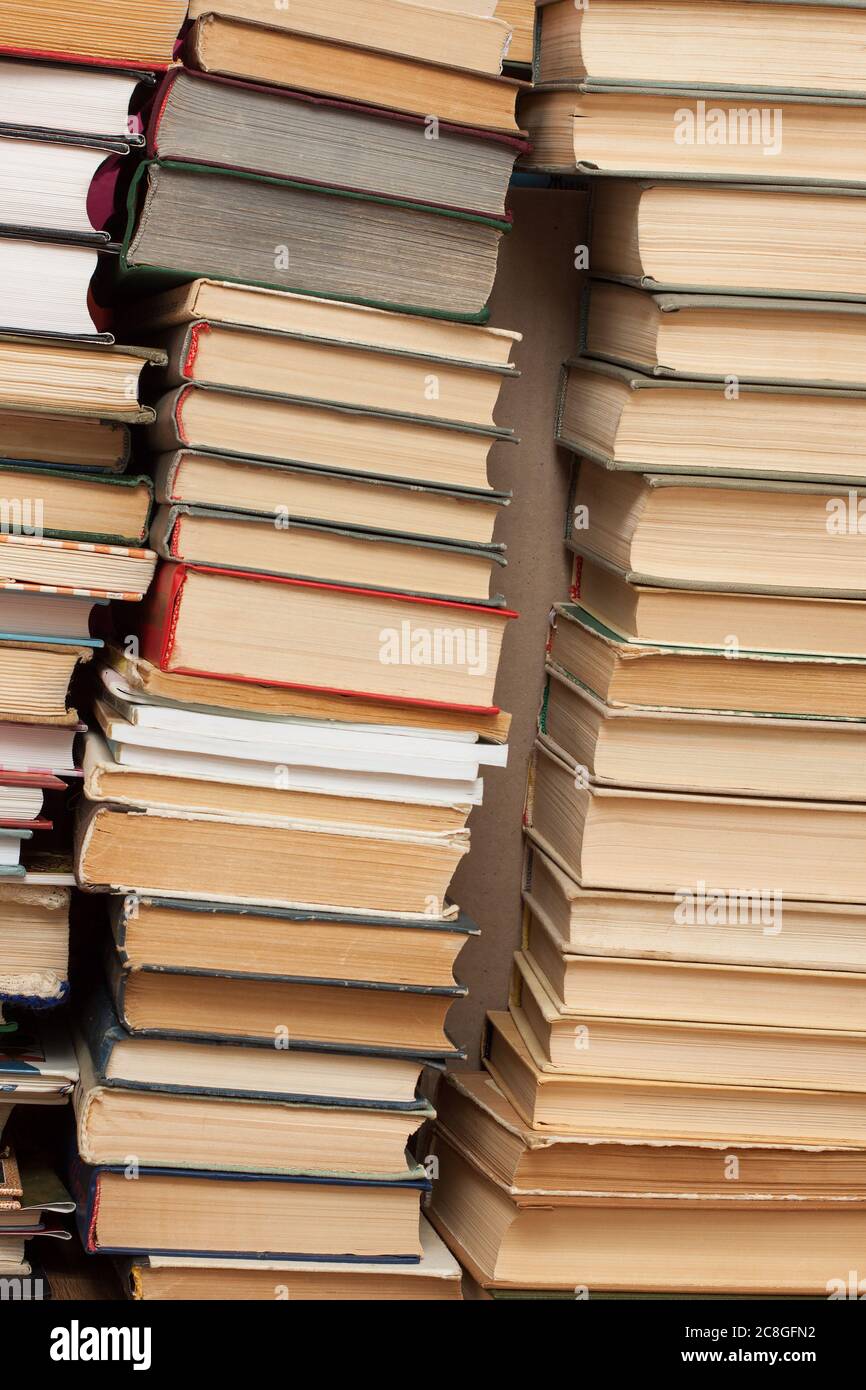 Many old books standing stacks. Education or library concept Stock ...