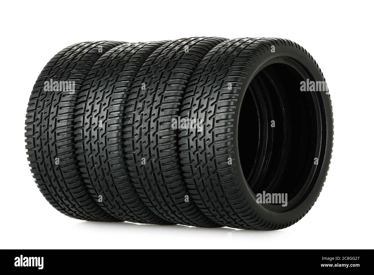 set of miniature tyres isolated on white Stock Photo - Alamy