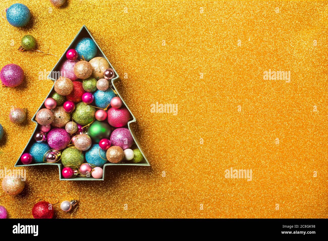 christmas tree shaped box with ornaments Stock Photo - Alamy