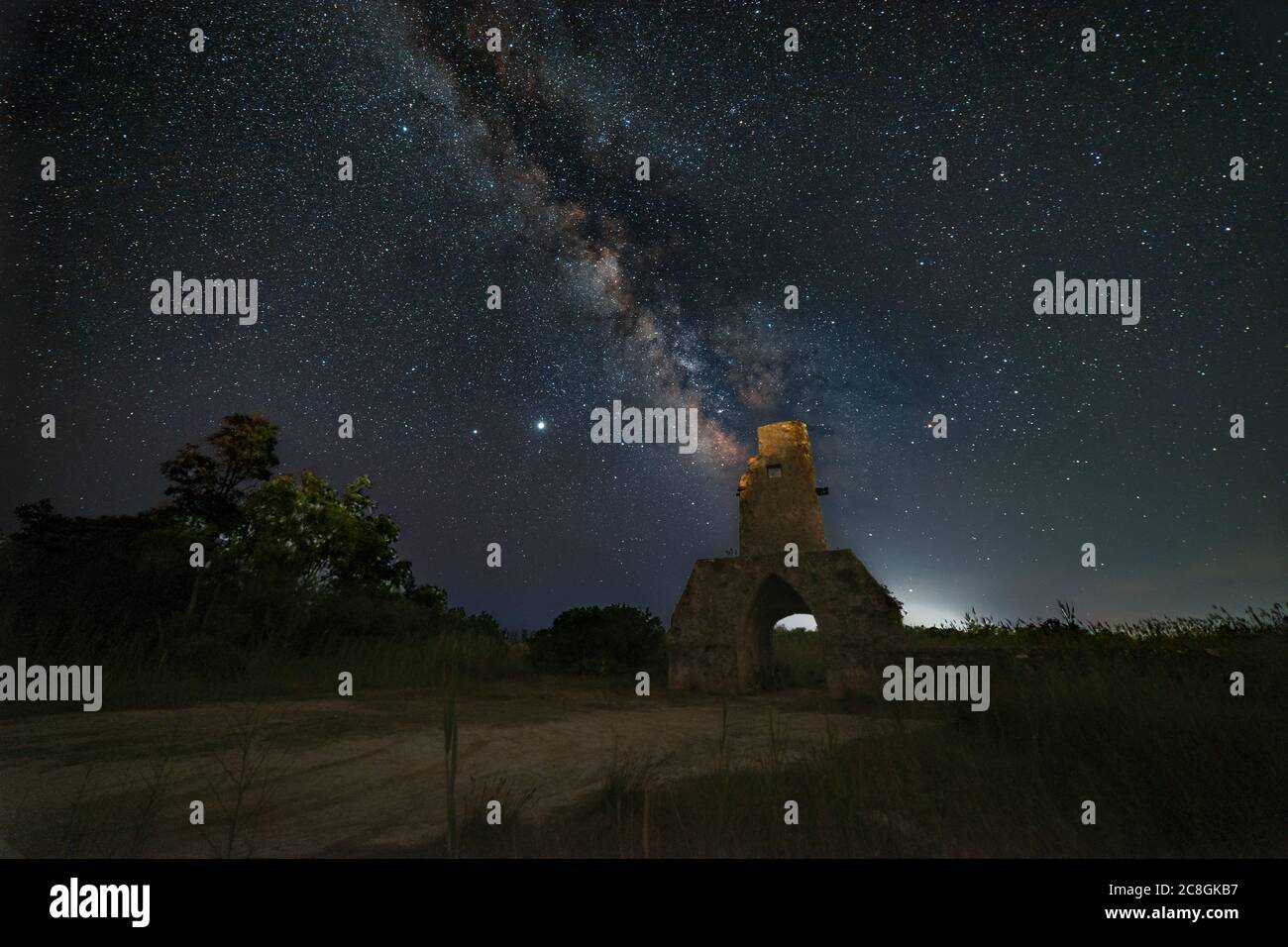 panorama of an old tower during a starry night with the milky way Stock ...
