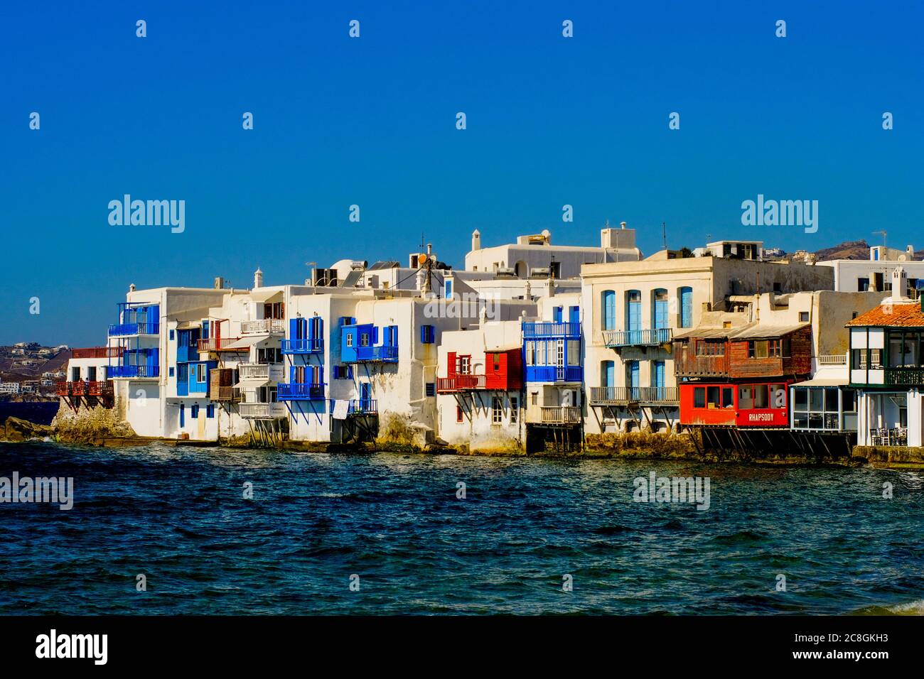 Buildings along the Aegean Sea on the Greek island of Mykonos Stock ...