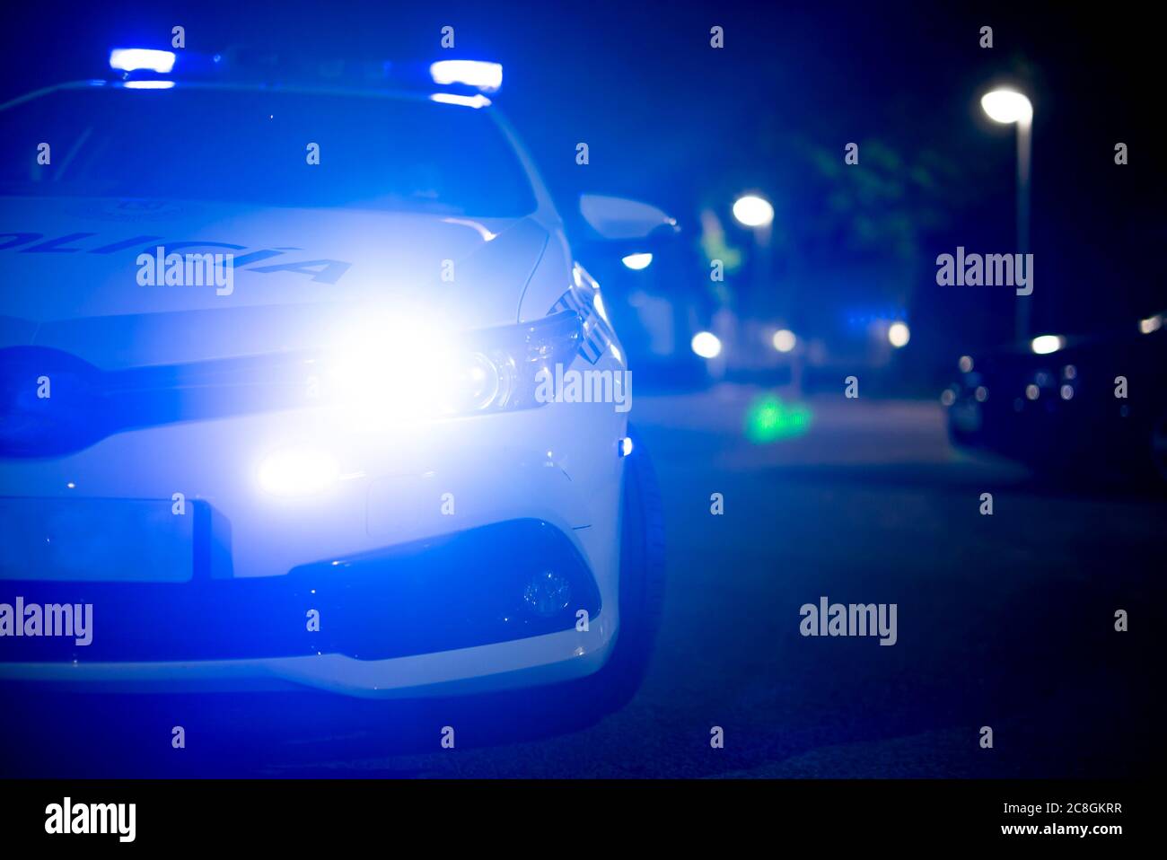 Police car with emergency lights on Stock Photo - Alamy