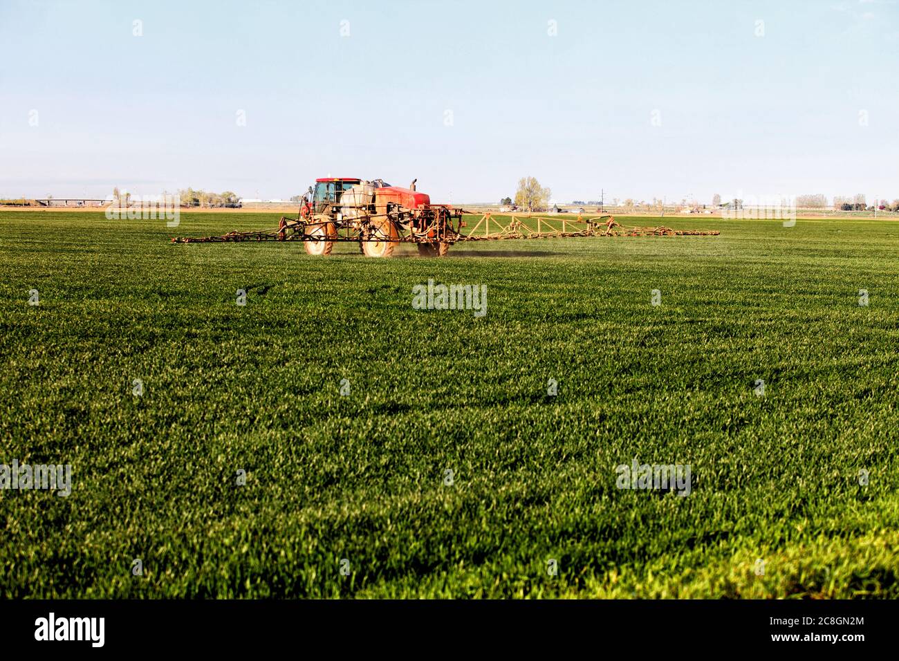 Agriculture farmer spraying fertilizer hi-res stock photography and ...
