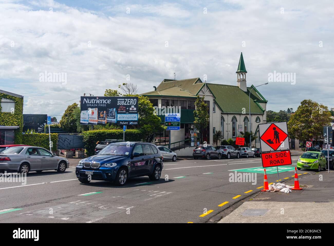 Road works warning sign and a church in The suburb Eden Terrace ...